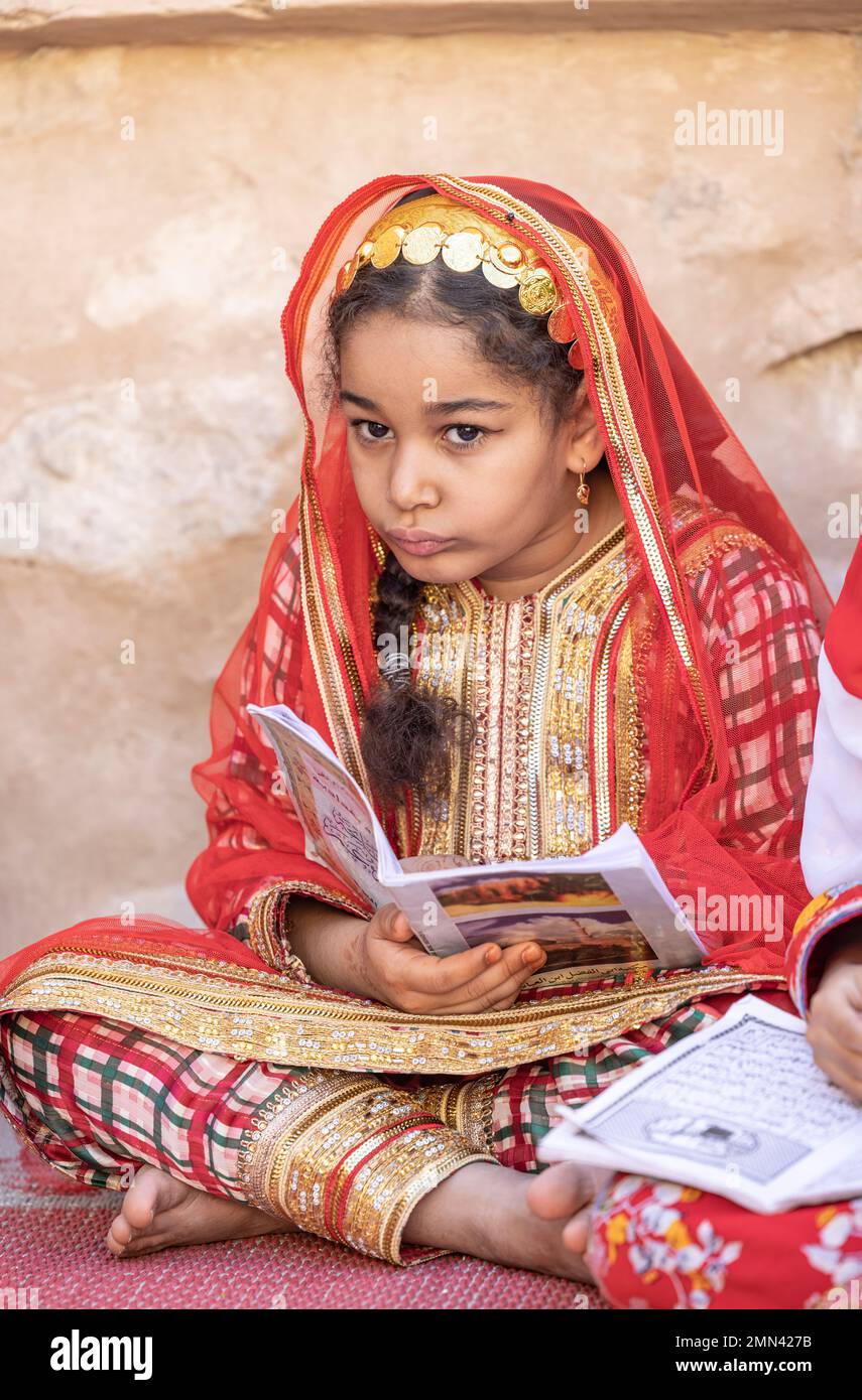 Nizwa, Oman, 2nd December 2022: omani girls reciting a Holy Book Stock ...