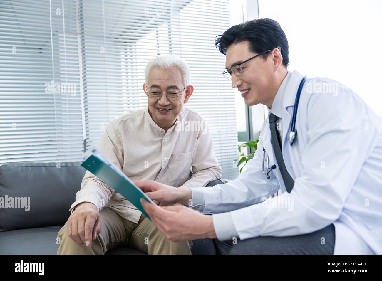 Older men and family doctor Stock Photo - Alamy