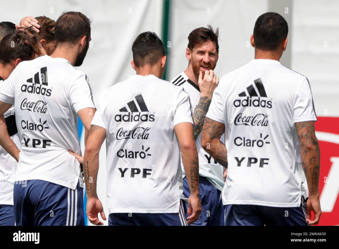 Lionel Messi and teammates gather at the center of the field at the ...