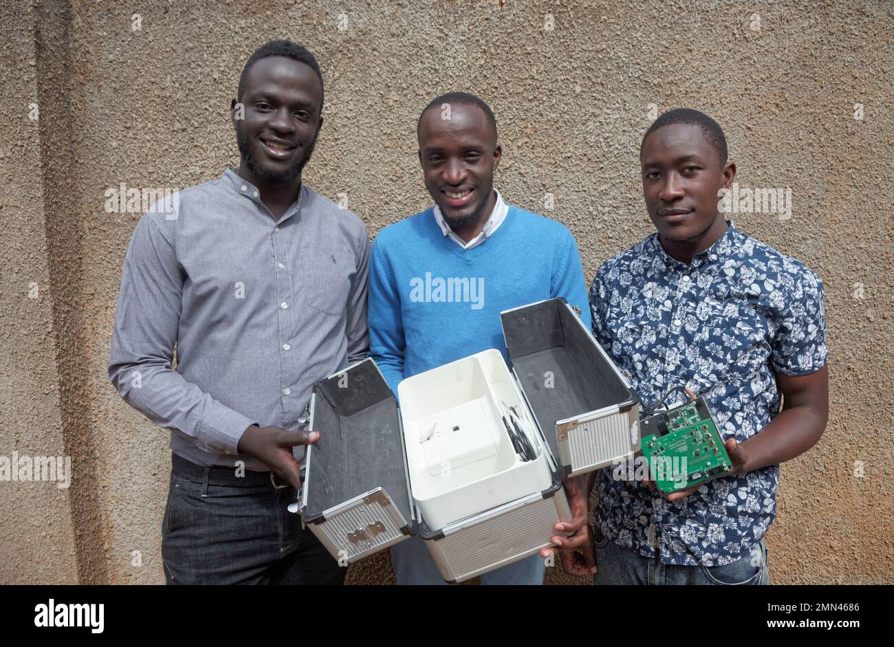 In this photo taken Monday, June 18, 2018, Ugandan Brian Gitta, left ...