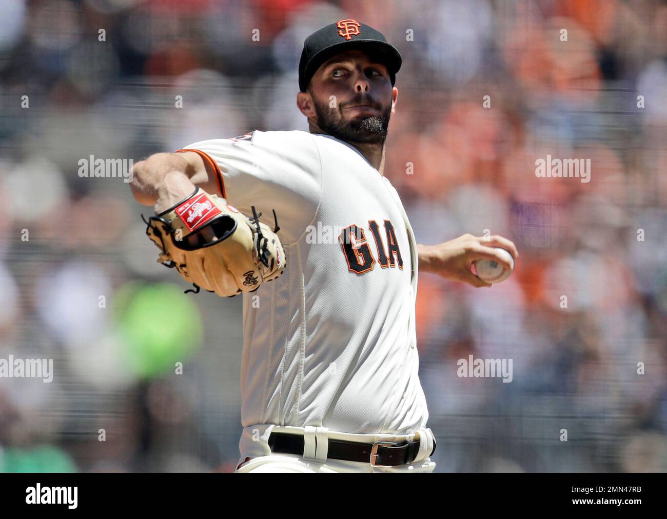 San Francisco Giants starting pitcher Andrew Suarez throws to the San ...