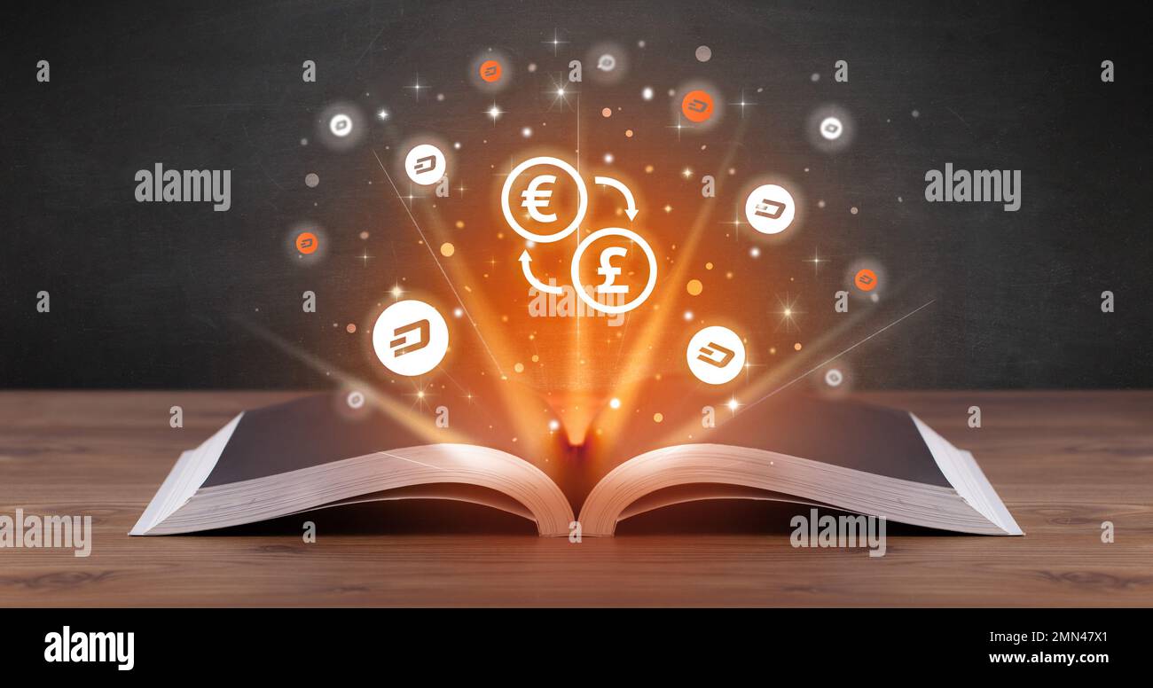 Open book with currency icons above Stock Photo - Alamy