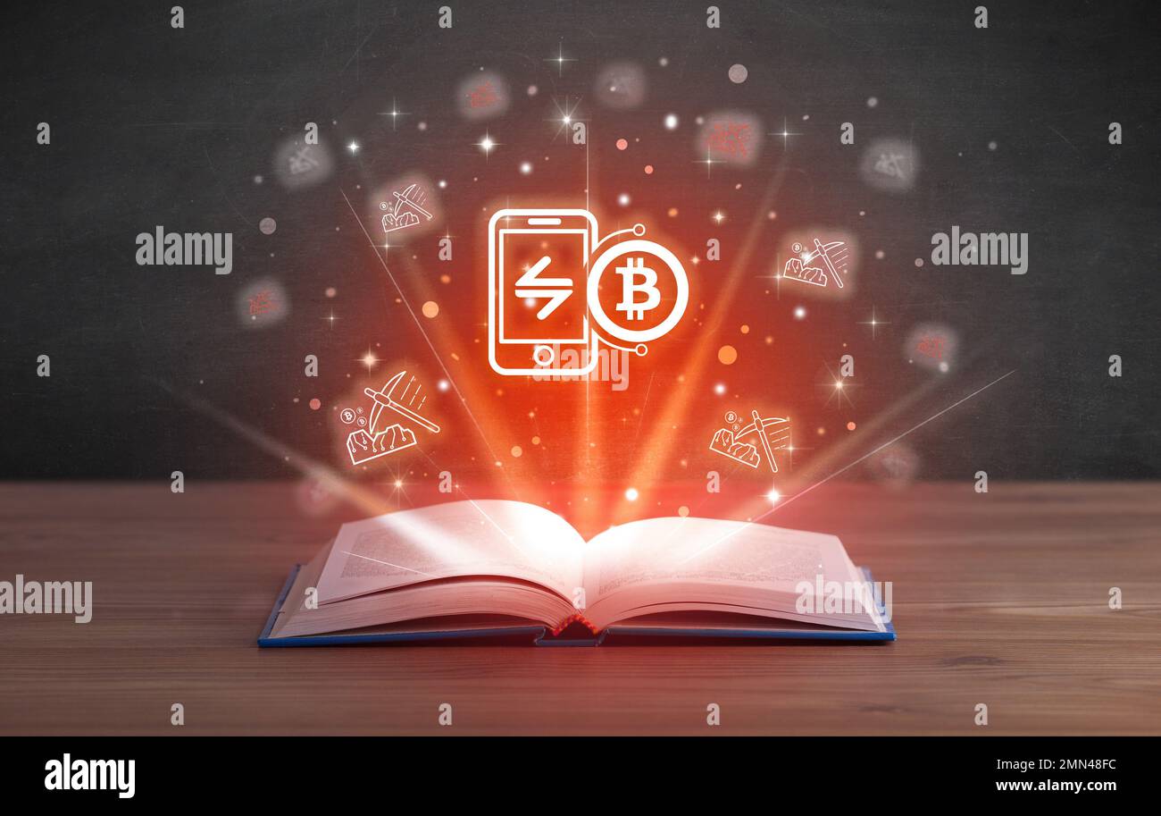 Open book with currency icons above Stock Photo - Alamy