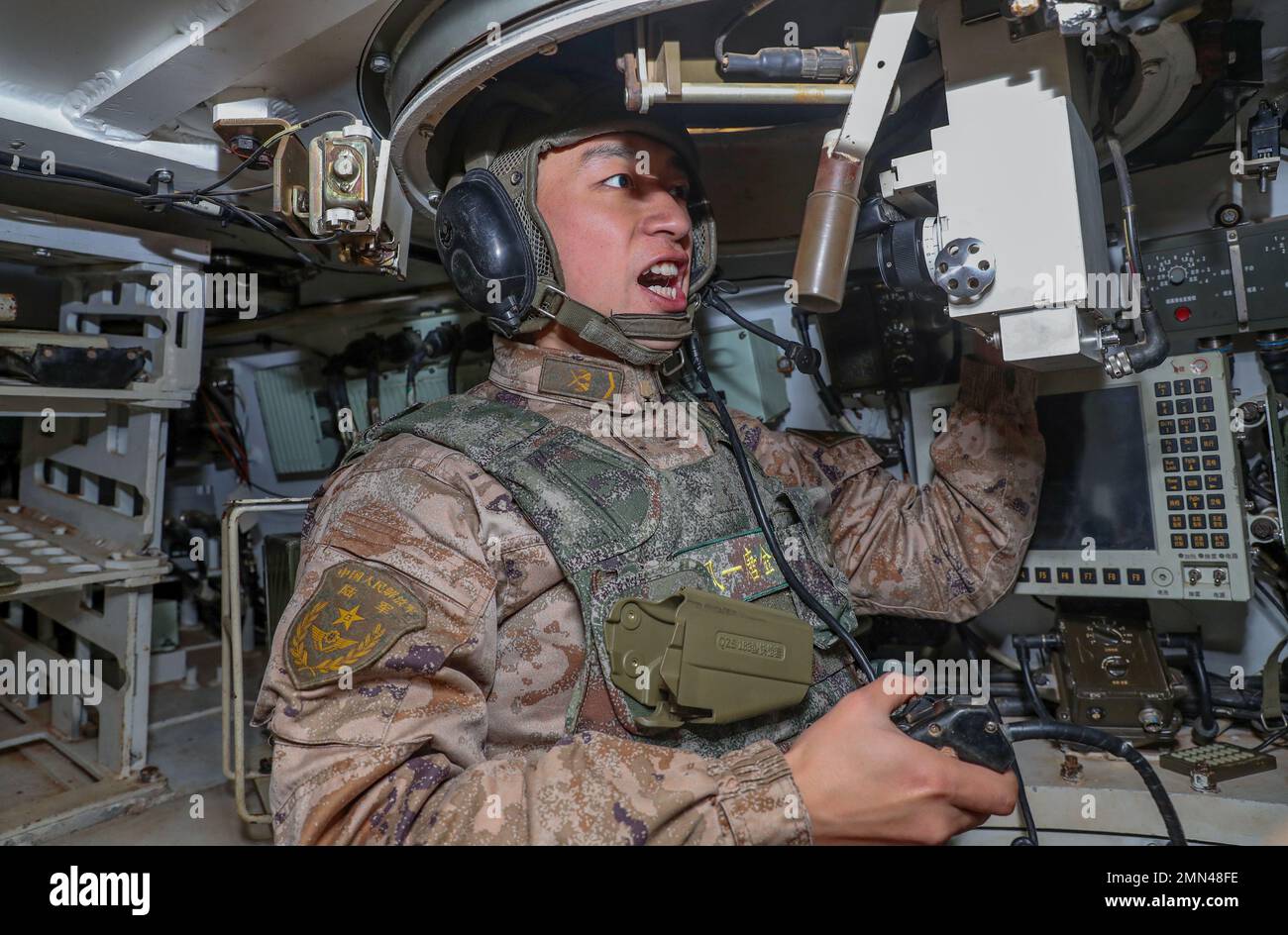 JIANGXI, CHINA - JANUARY 29, 2023 - Vehicle commander gives strike order, January 29, 2023 ...