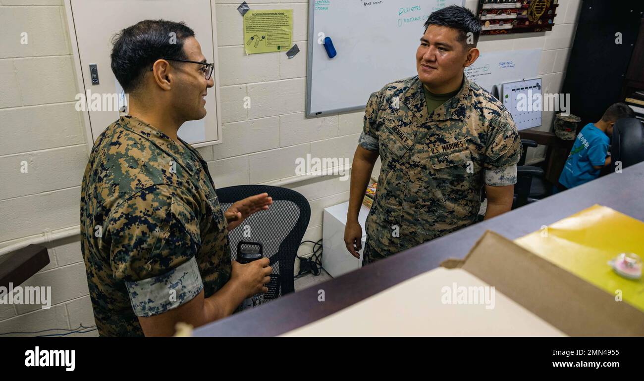 U.S. Marine Corps Sgt. Hamza Harroufy, left, and Sgt. Eathen Benally ...