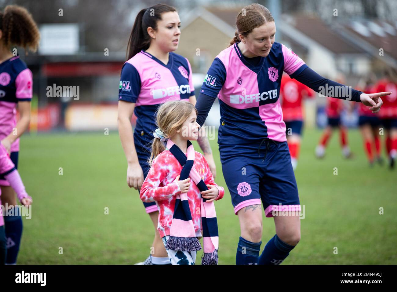 Ceylon Hickman (13 Dulwich Hamlet) with a mascot Stock Photo - Alamy
