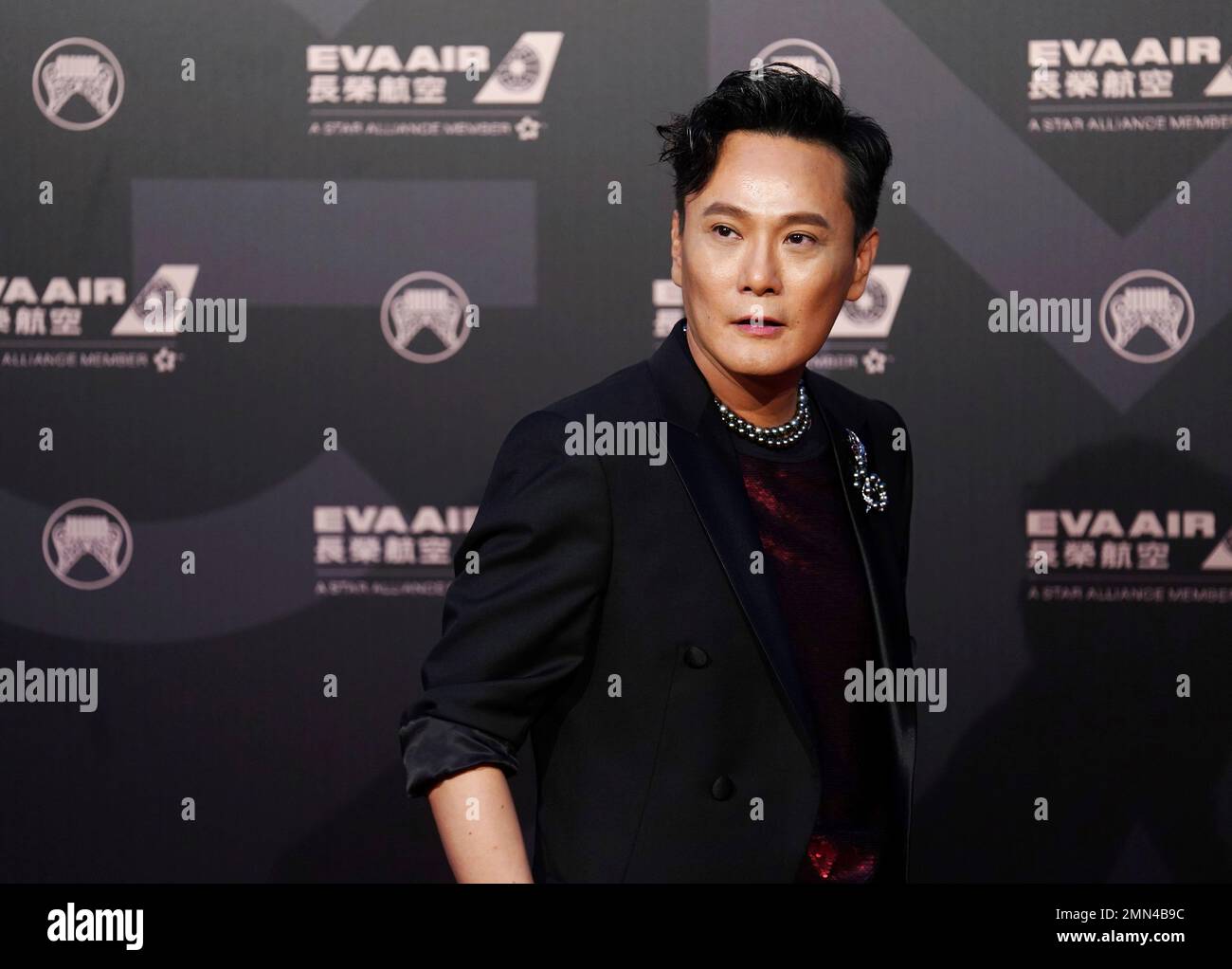Taiwanese singer Jeff Chang smiles as he arrives at the 29th Golden ...