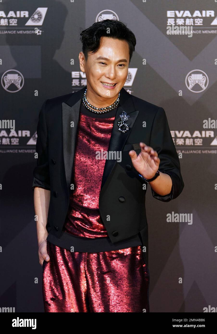 Taiwanese singer Jeff Chang smiles as he arrives at the 29th Golden ...