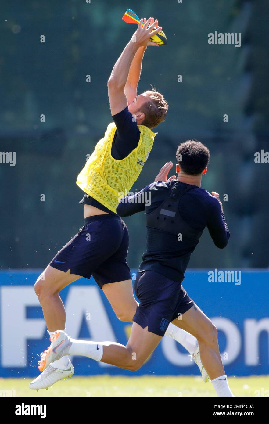 England's Harry Kane, left, and his teammate attend England's official ...
