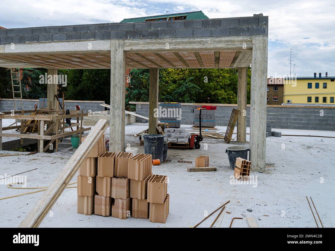construction site building with cement material structure and brickwall ...