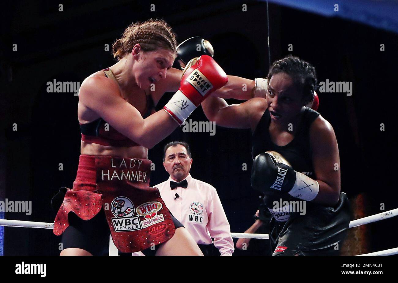 Christina Hammer, left, of Germany, and Tori Nelson fight during their ...