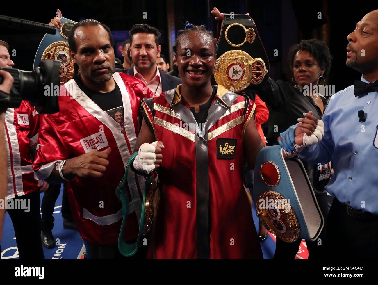 Claressa Shields poses with her championship belts after defeating Hanna Gabriels, of Costa Rica ...