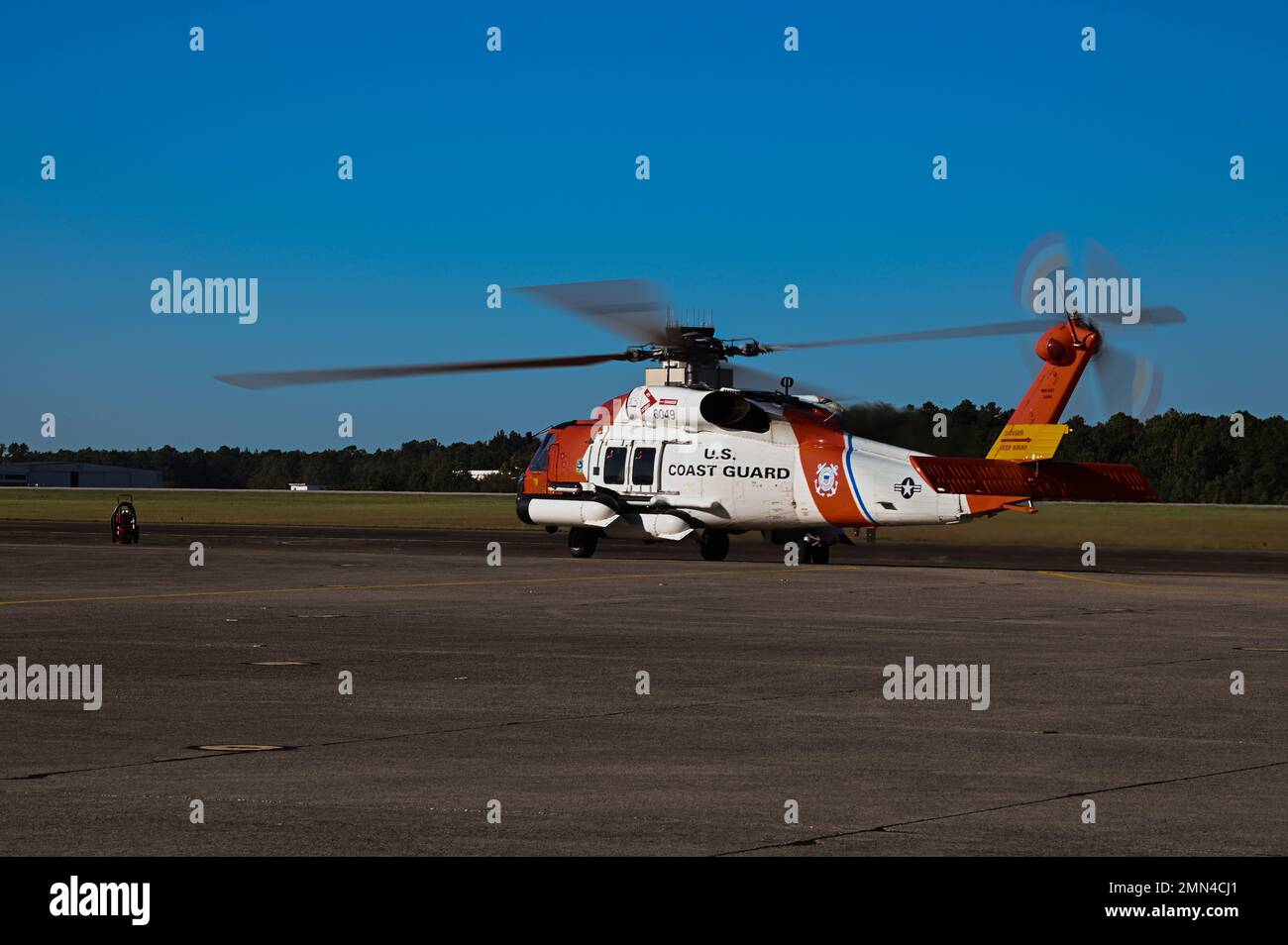 A Coast Guard Aviation Training Center Mobile MH-60 Jayhawk helicopter ...