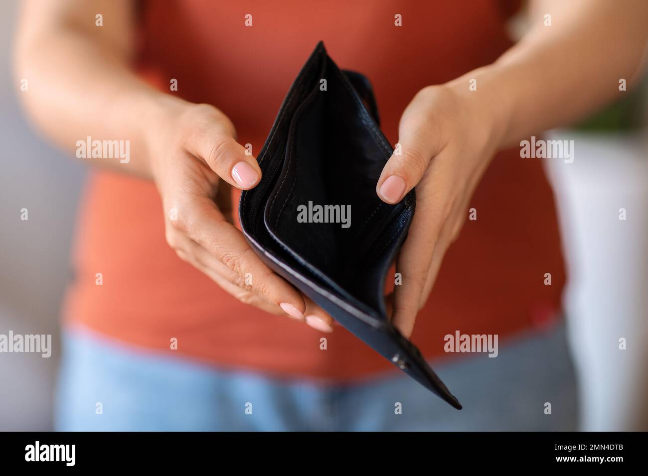 Poverty Concept. Unrecognizable Woman Showing Empty Wallet At Camera ...