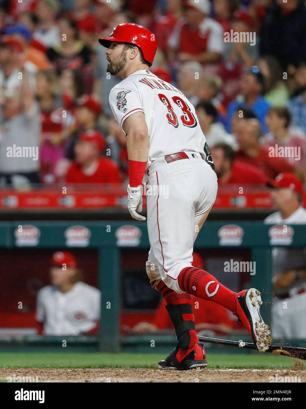 Cincinnati Reds' Jesse Winker watches his grand slam off Chicago Cubs ...