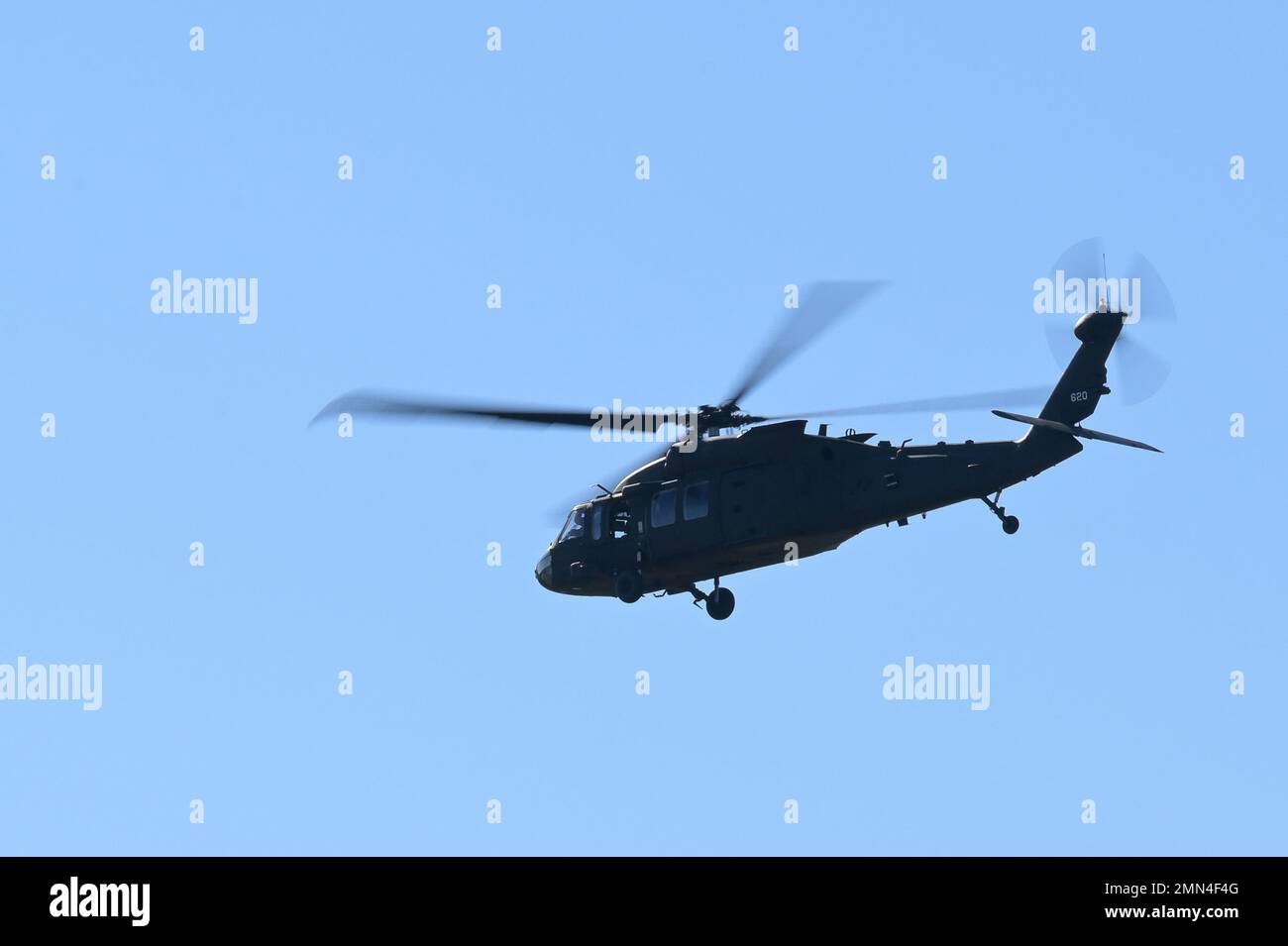 A Louisiana National Guard UH-60 Black Hawk helicopter departs a ...