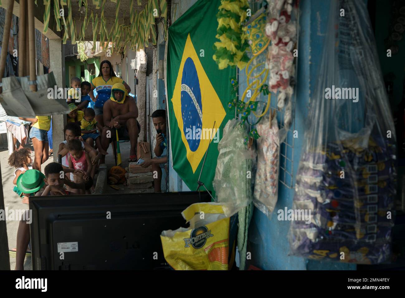 Brazilian soccer fans watch a live telecast of their team's World Cup ...