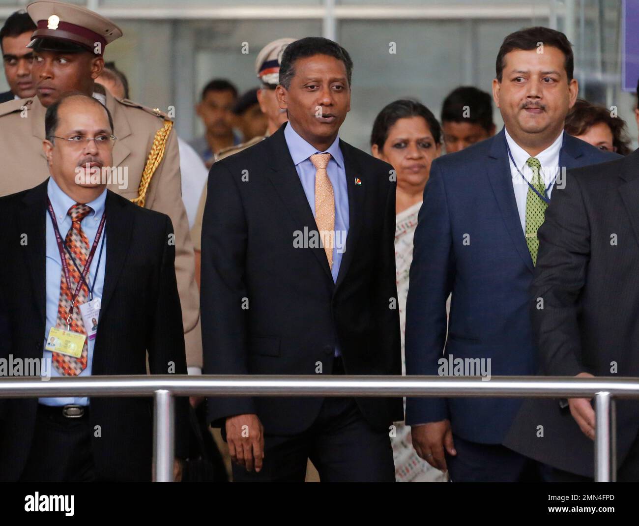 Seychelles President Danny Faure, center, arrives at the airport in ...