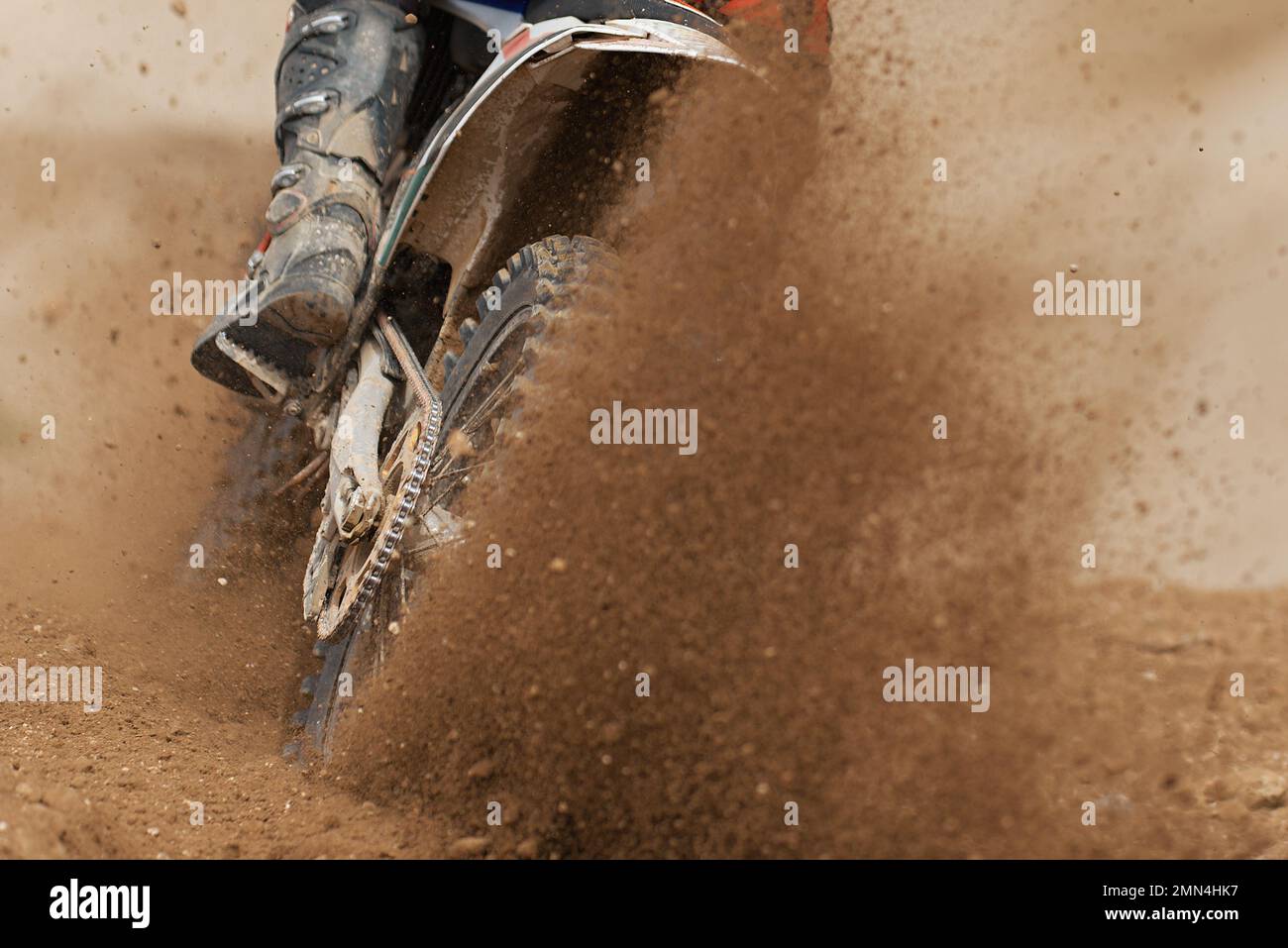 Rider driving in the motocross race the rear wheel motocross bike Stock ...