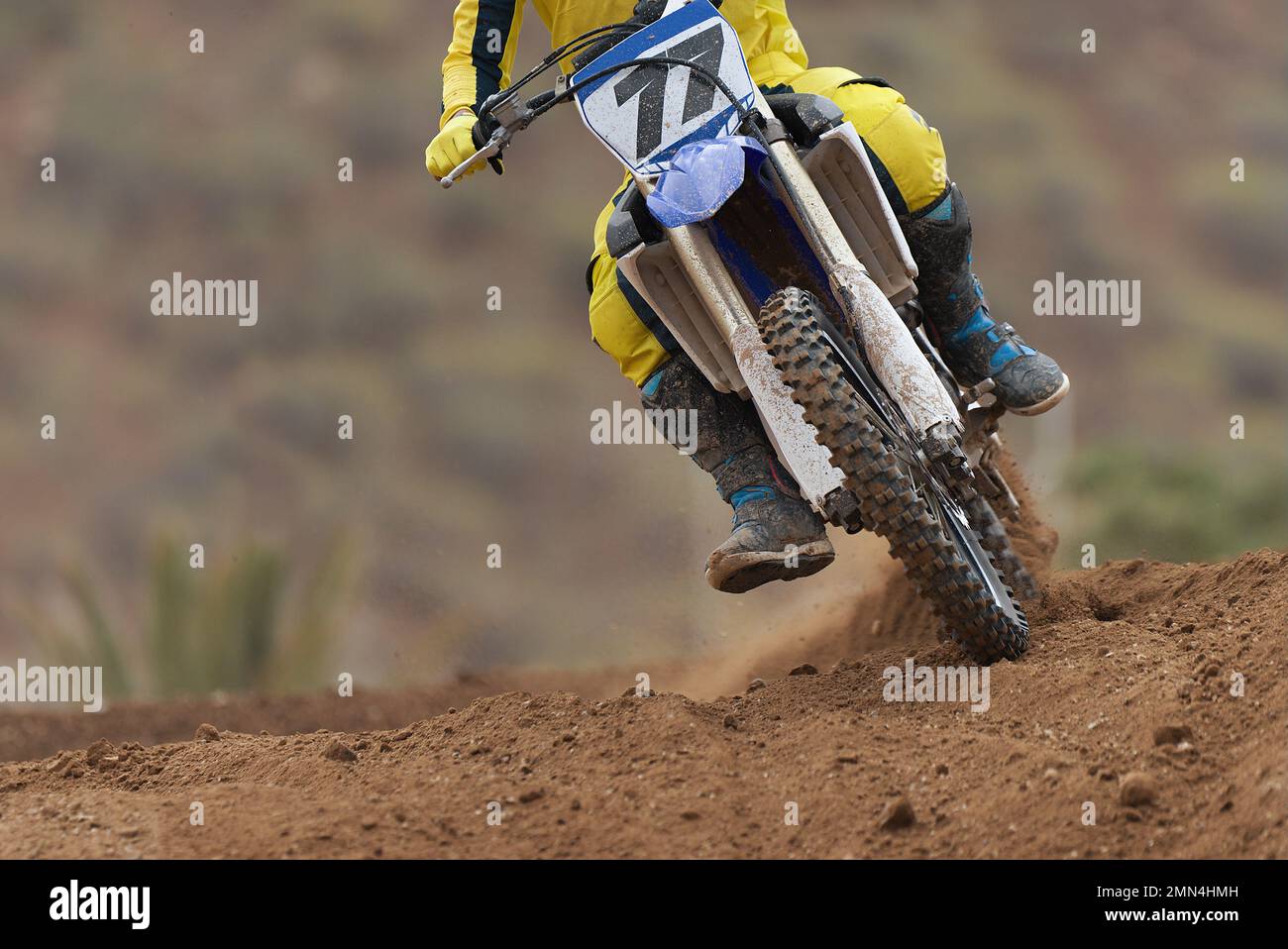 Rider driving in the motocross race the rear wheel motocross bike Stock ...