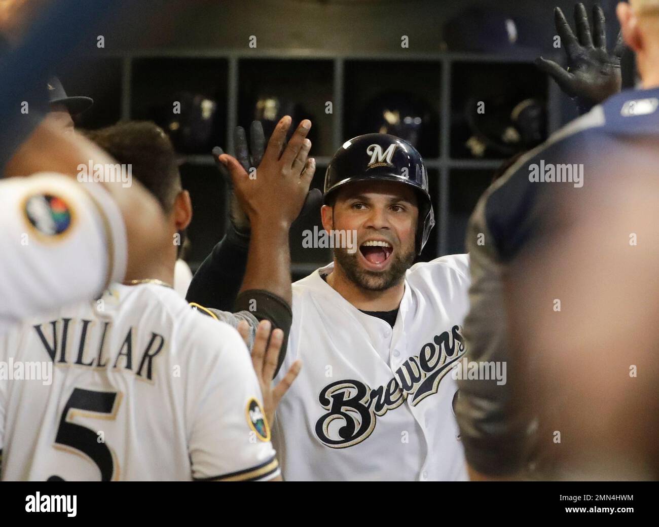 Milwaukee Brewers' Manny Pina celebrates after hitting a home run ...