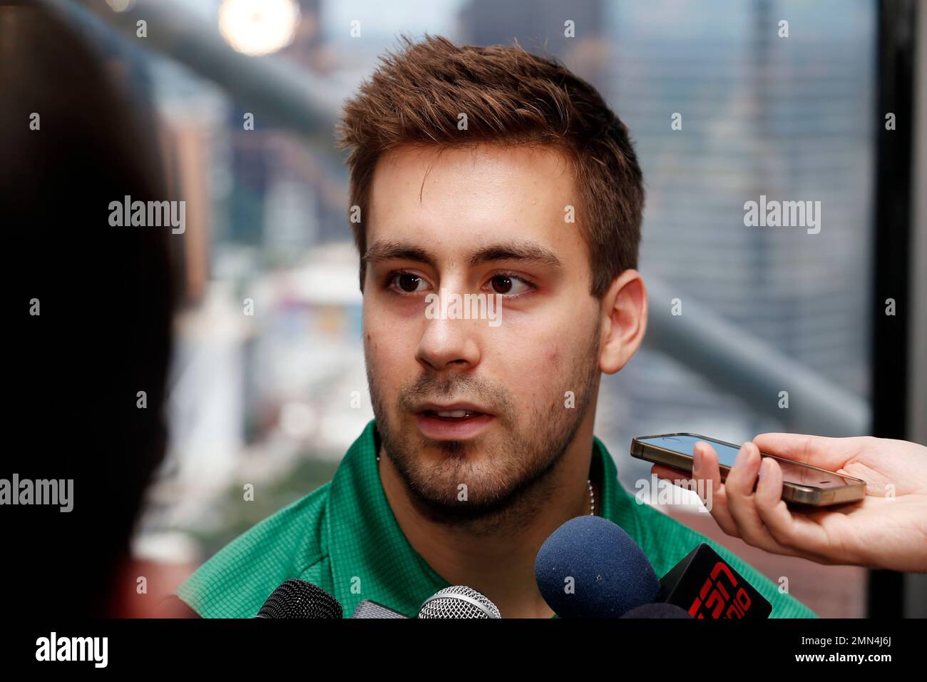 Evan Bouchard of Canada talks to the media in Dallas, Thursday, June 21 ...