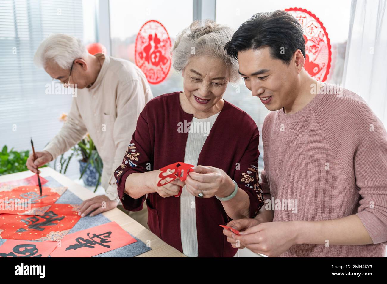 Happy three in paper cutting Stock Photo - Alamy