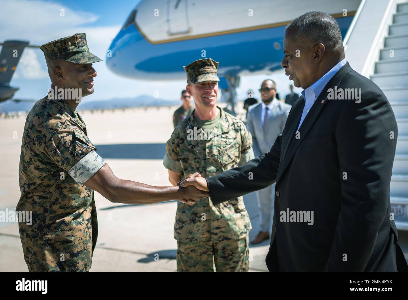 Secretary of Defense Lloyd J. Austin III greets Sgt. Maj. Lacey Lewis ...
