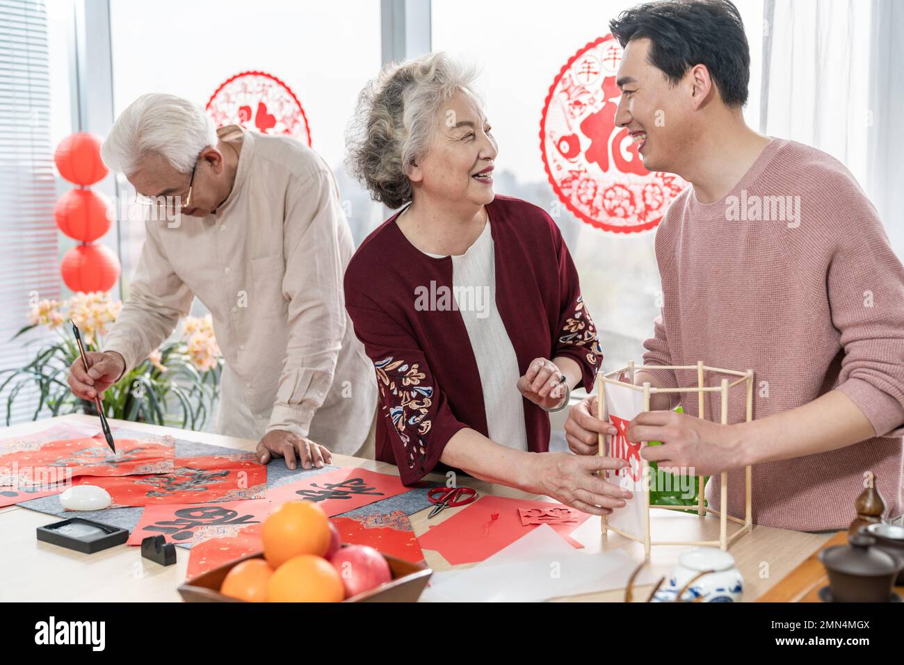 Chinese paper cutting scissors hi-res stock photography and images - Alamy
