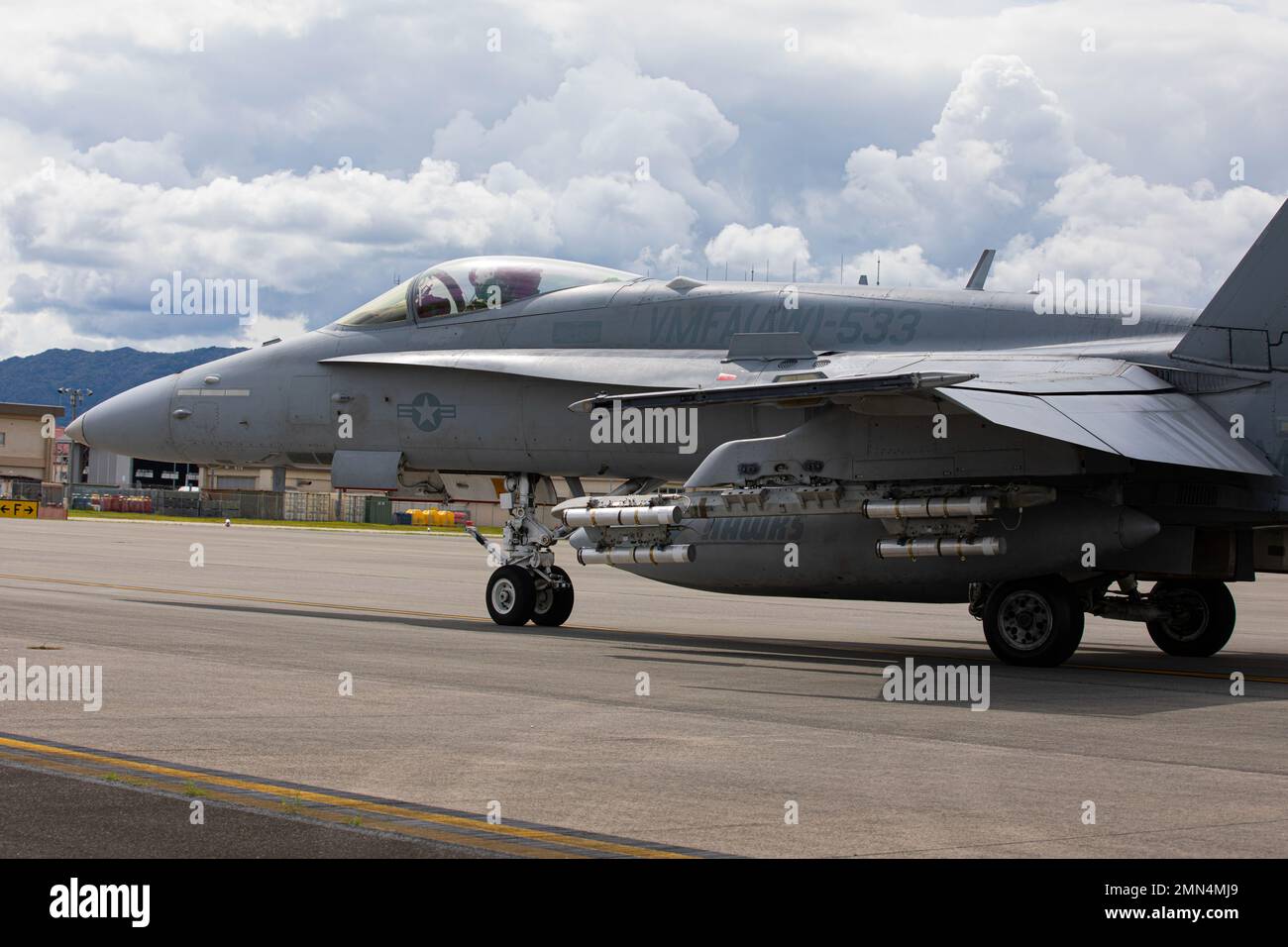 A U.S. Marine Corps F/A-18C Hornet aircraft with Marine All Weather ...