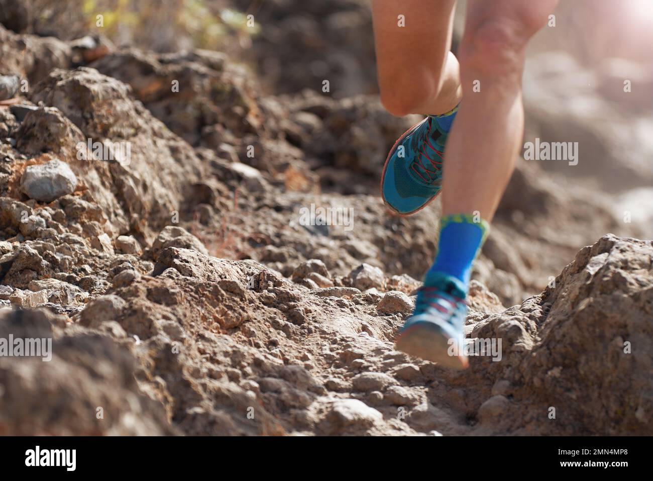 Trail running action close up of running shoes in action Stock Photo ...