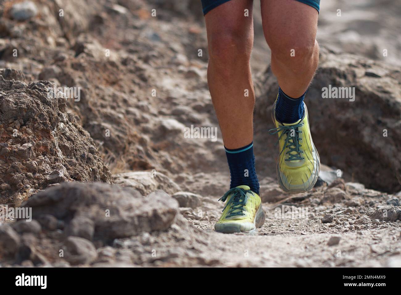 Trail running action close up of running shoes in action Stock Photo ...