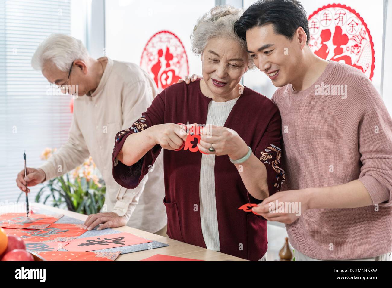 Happy three in paper cutting Stock Photo - Alamy