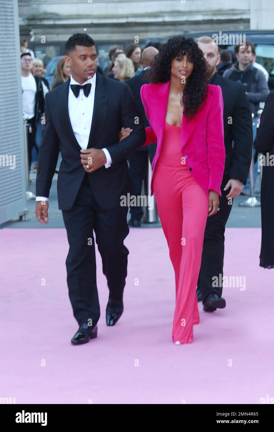 NFL football quarterback Russell Wilson, left, and singer Ciara arrive ...