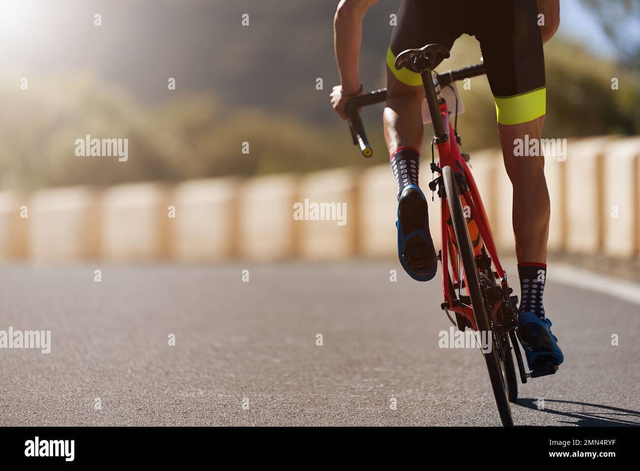 Road bike cyclist man cycling, athlete on a race cycle Stock Photo - Alamy