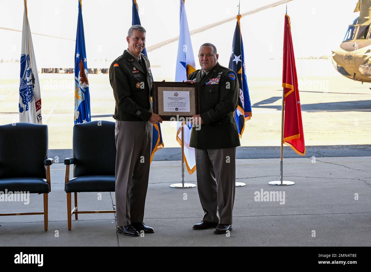 U.S. Army Gen. Daniel Hokanson (left), Chief of the National Guard ...