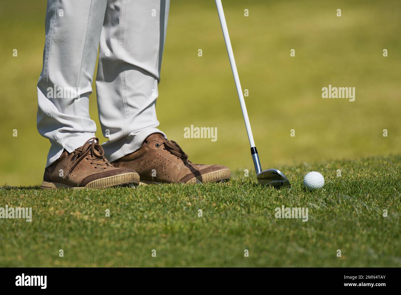 Business man playing golf hi-res stock photography and images - Alamy