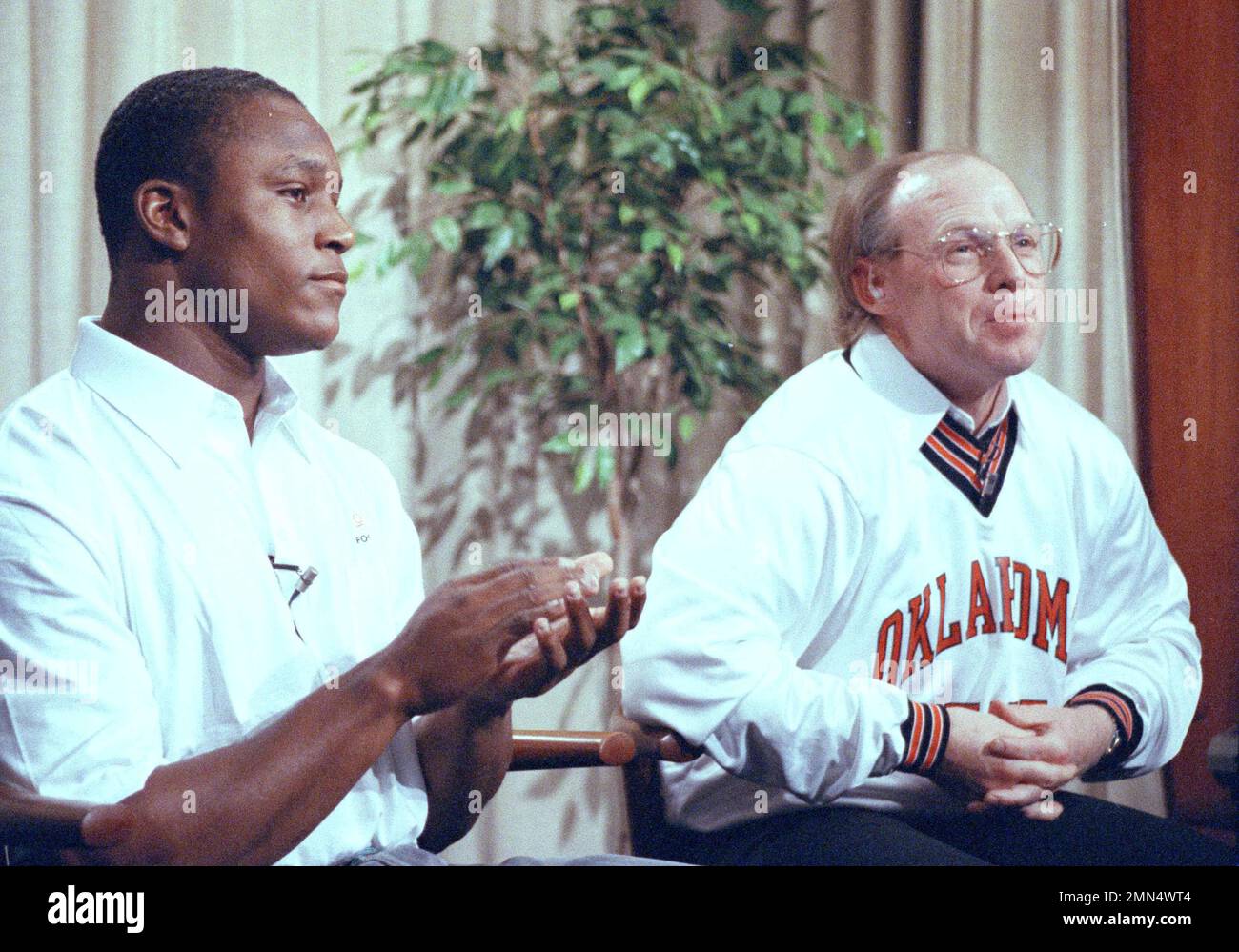Oklahoma State's Barry Sanders, left, and coach Pat Jones appear for a ...
