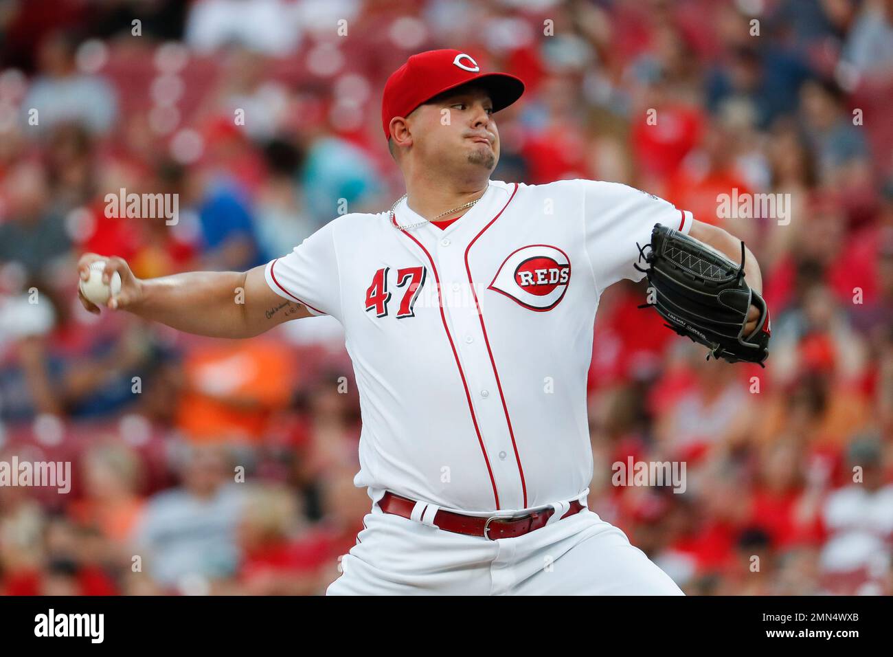 Cincinnati Reds starting pitcher Sal Romano throws in the first inning ...