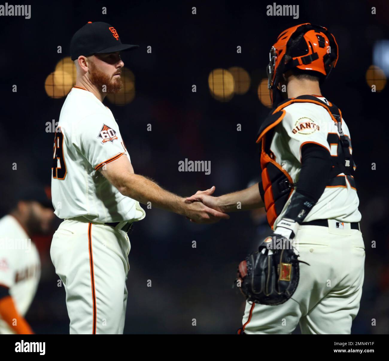 San Francisco Giants pitcher Sam Dyson, left, and catcher Buster Posey ...