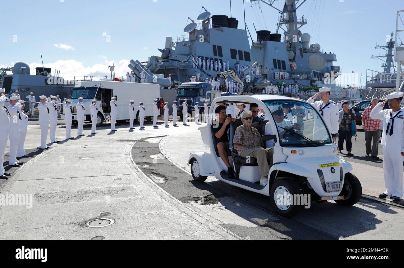 With sailors lining the dock and deck of the USS O'Kane, Pearl Harbor ...
