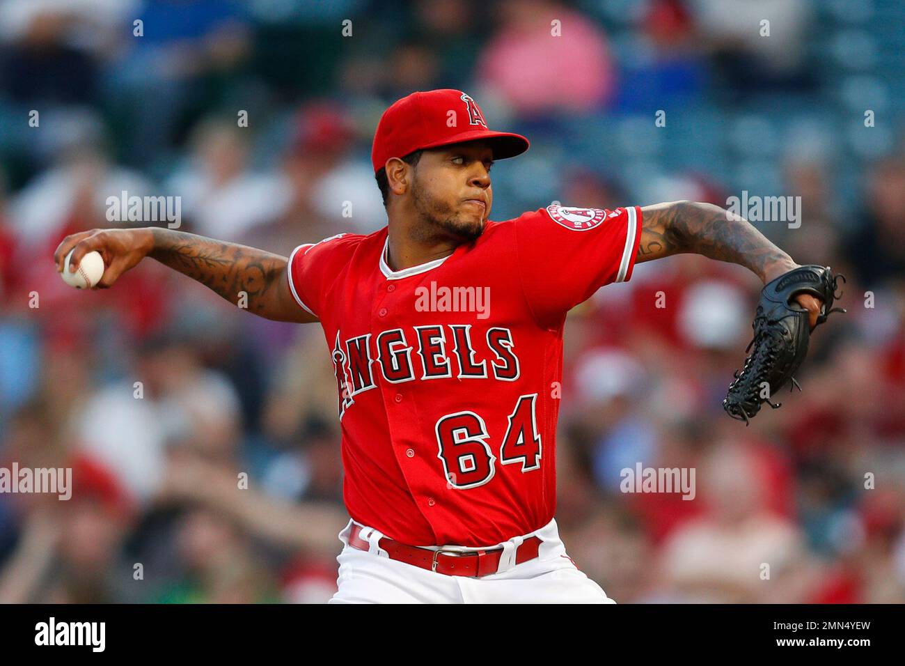 Los Angeles Angels starting pitcher Felix Pena throws to an Arizona ...
