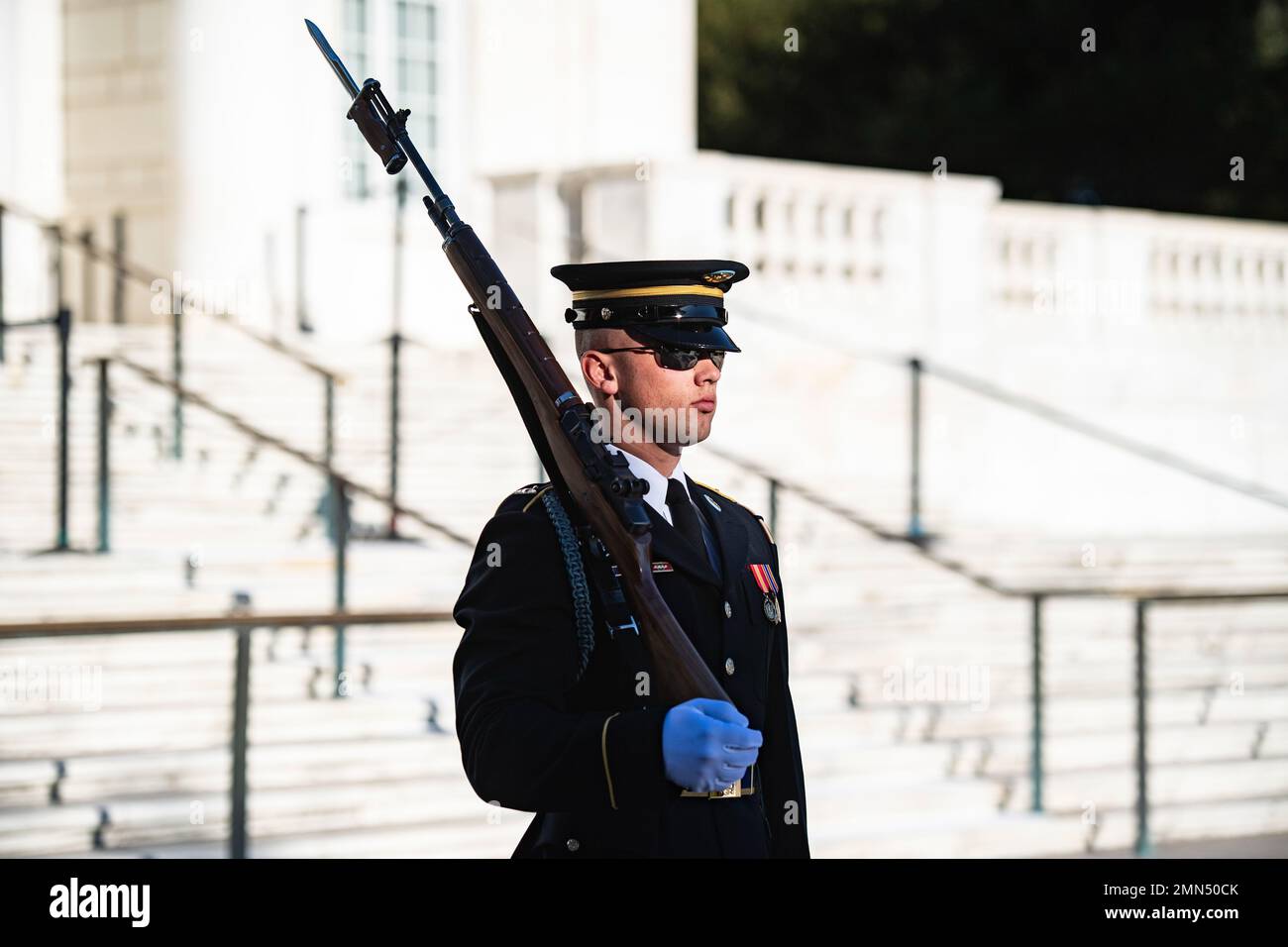 A tomb guard from the 3d U.S. Infantry Regiment (The Old Guard) walks ...