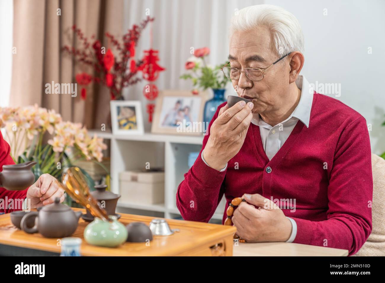 Happy old man a cup of tea Stock Photo - Alamy
