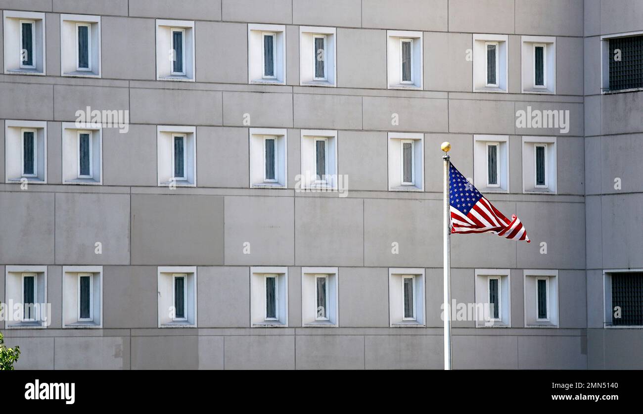 A U.S. flag flutters outside the Federal Detention Center where Blanca ...
