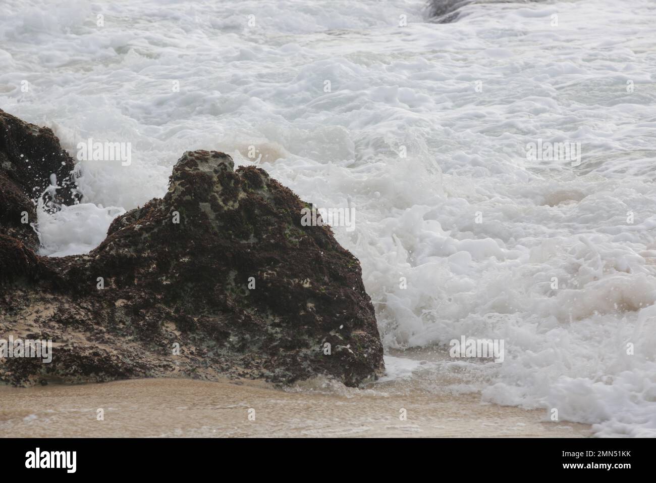 Wave crashing on coastal rocks hi-res stock photography and images - Alamy