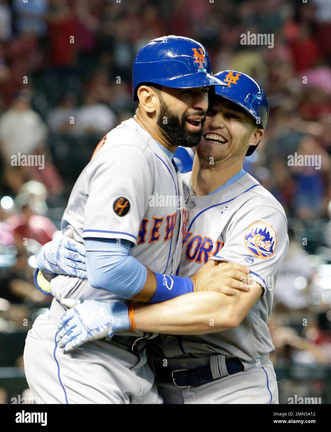 New York Mets' Brandon Nimmo, left, celebrates with Jose Bautista after ...