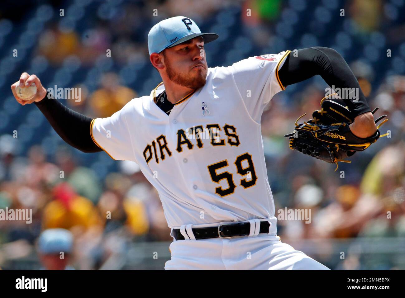 Pittsburgh Pirates starting pitcher Joe Musgrove delivers in the first ...