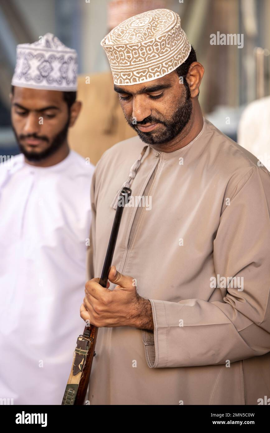 Nizwa, Oman, 2nd December 2022: omani men at the guns market Stock ...