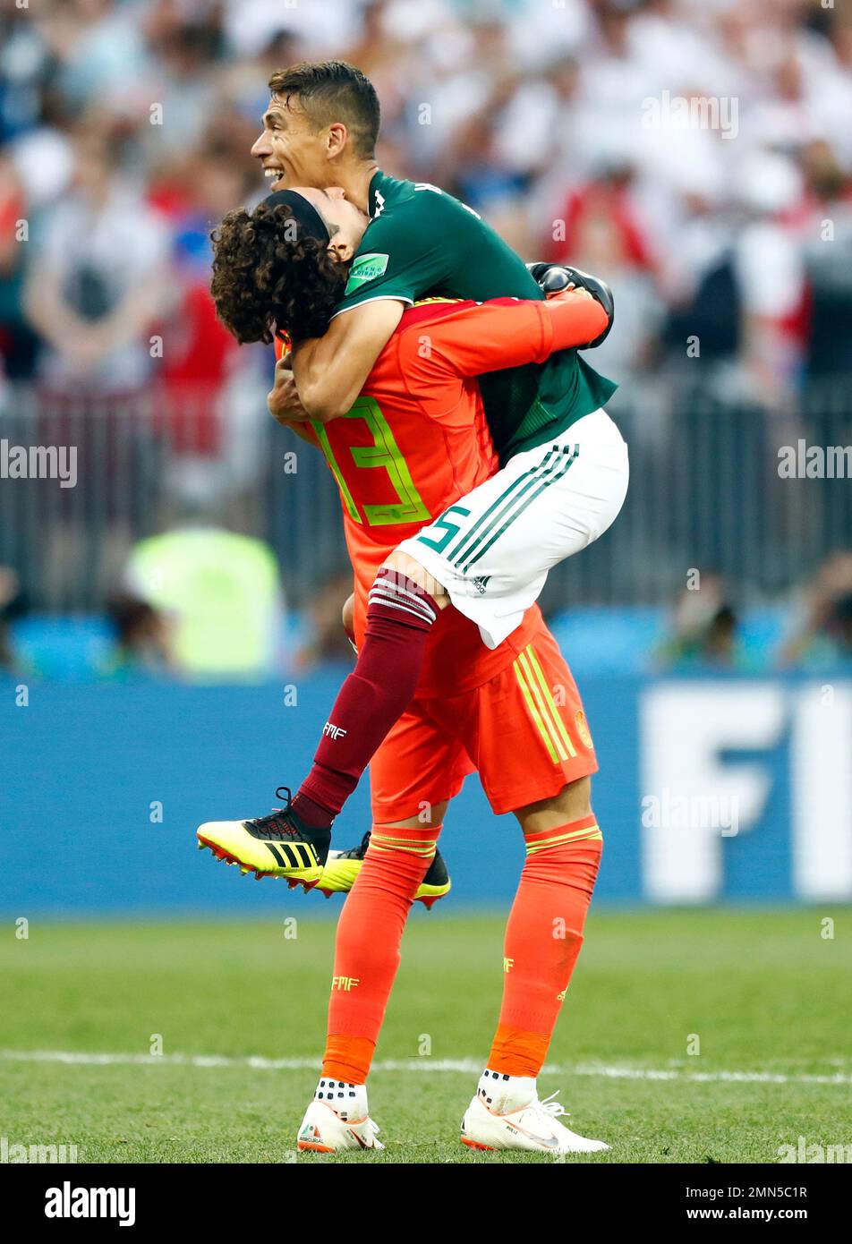 Mexico goalkeeper Guillermo Ochoa, left, and Mexico's Hector Moreno ...